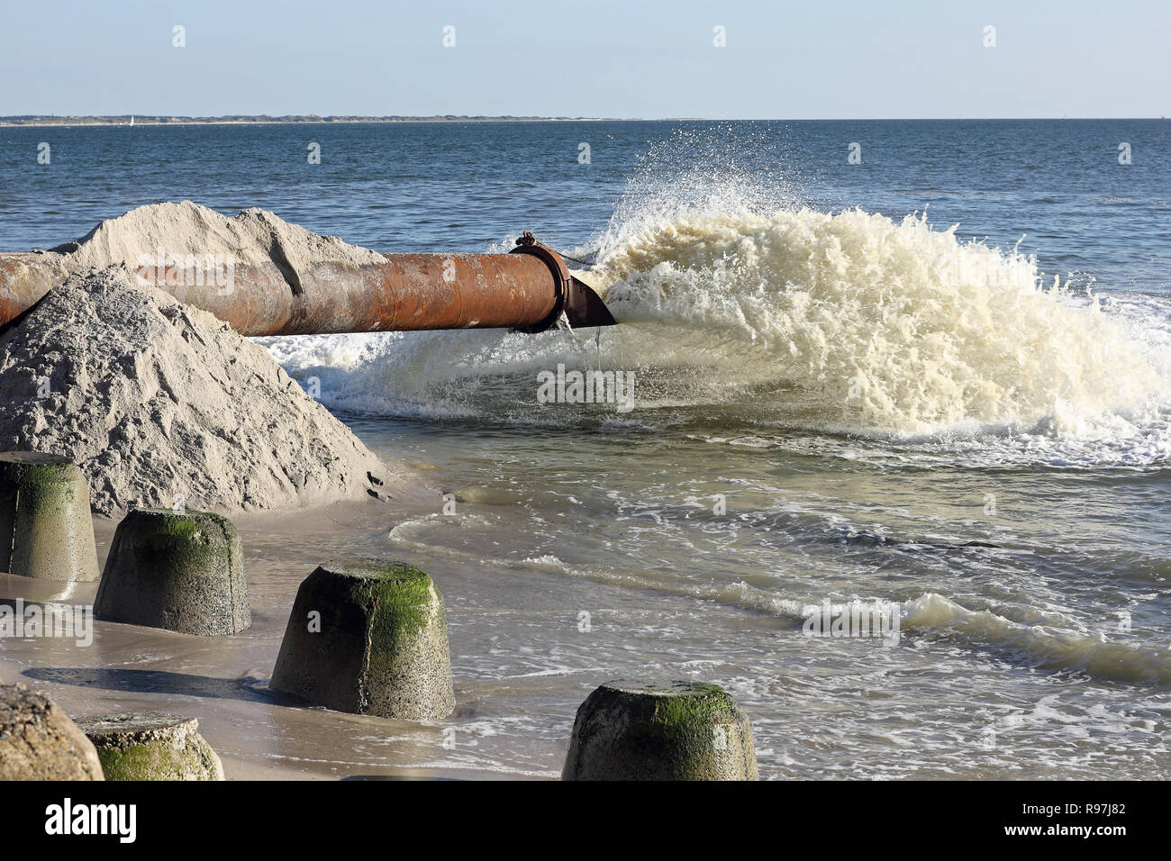 Sand replenishment for the coast protection on Sylt Stock Photo - Alamy