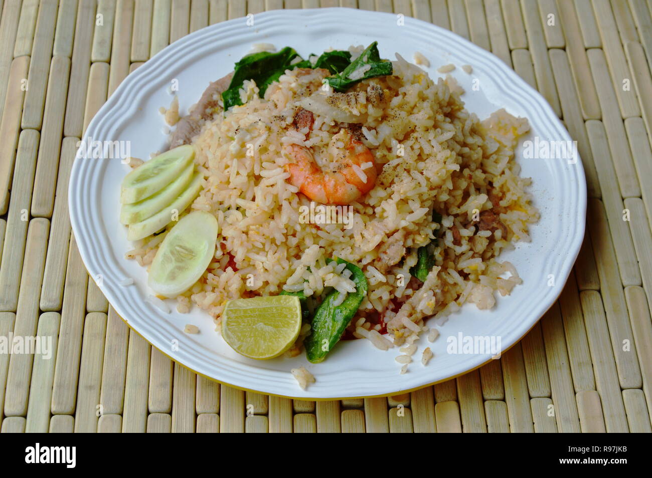fried rice mixed seafood and pork and glass of fish sauce Stock Photo ...