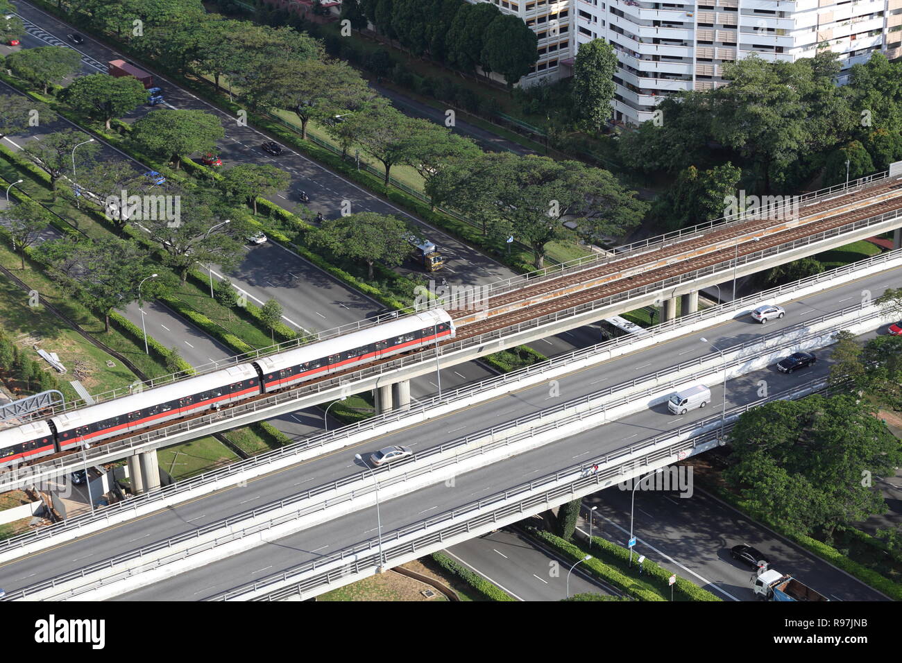 Aerial view of SMRT public train service and highway roads in Singapore ...