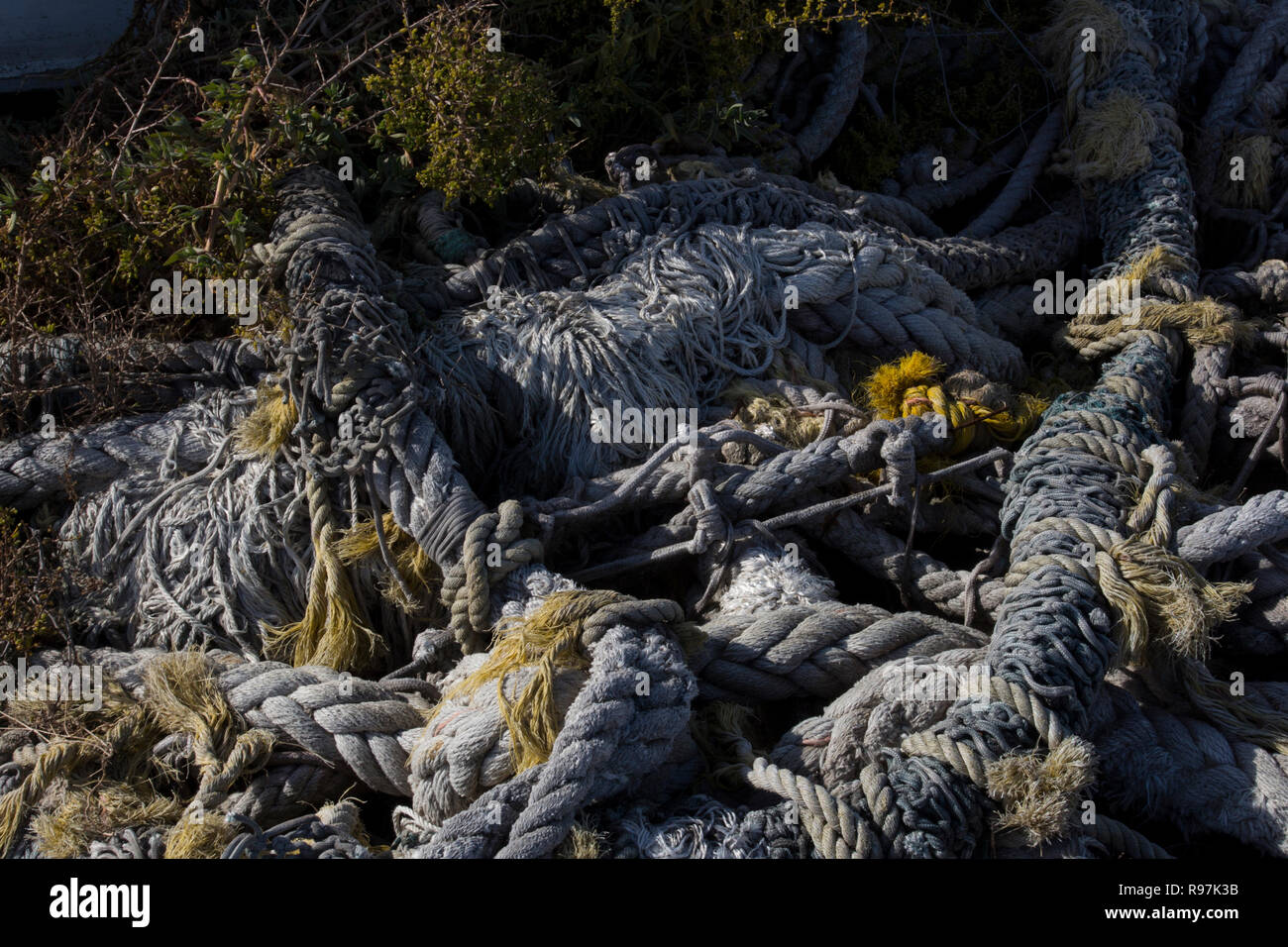 A Pile of rope lying on the beach Stock Photo - Alamy