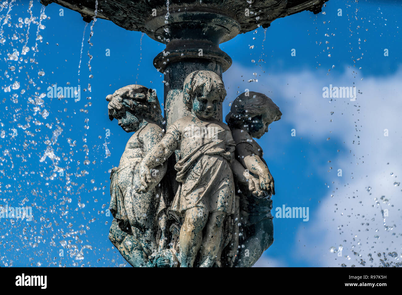 Bronze divinity statues in the Rossio Square fountain, built in 1889 in ...