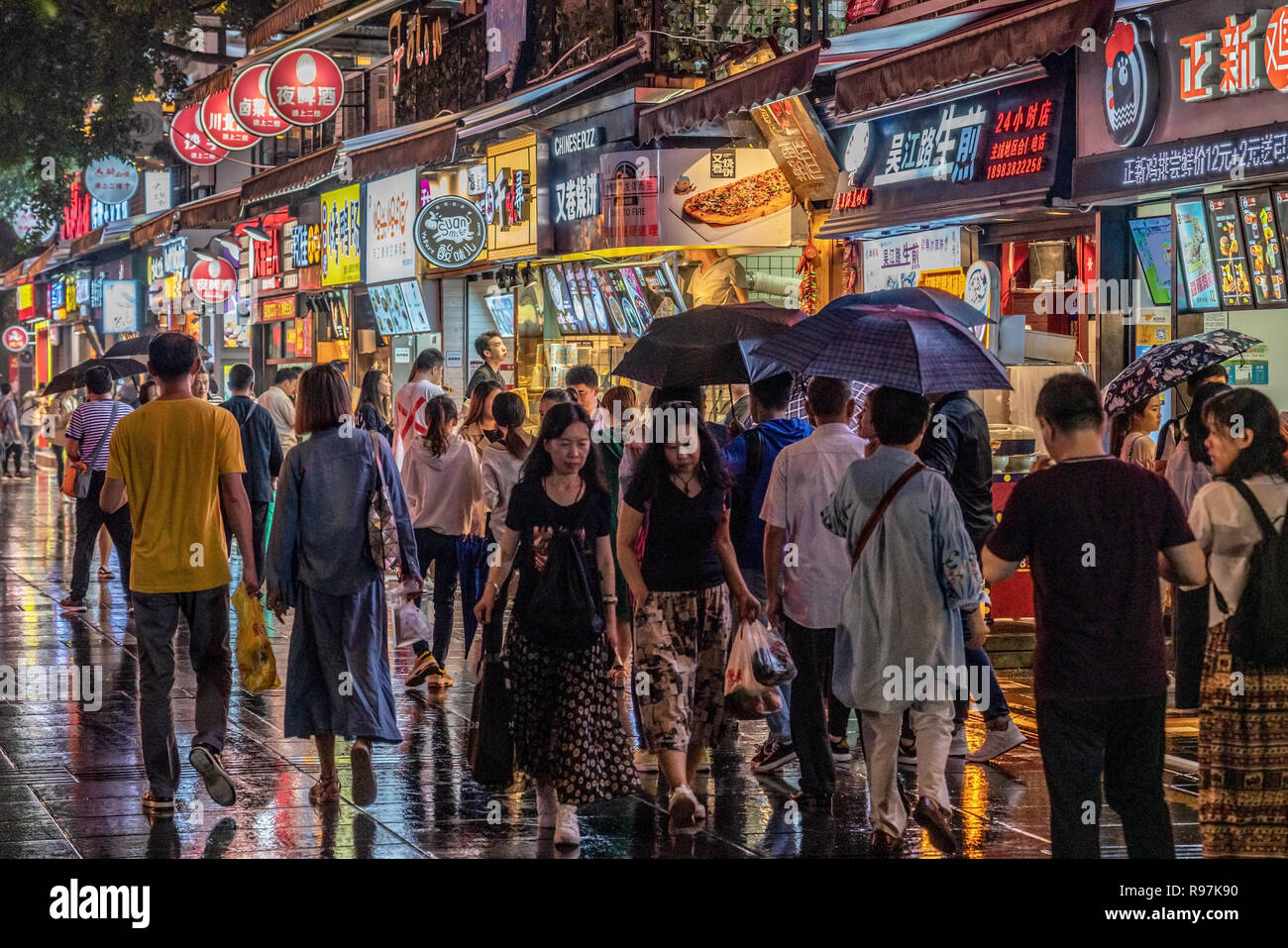 This is Jiaochangkou night market, a famous night market and travel ...