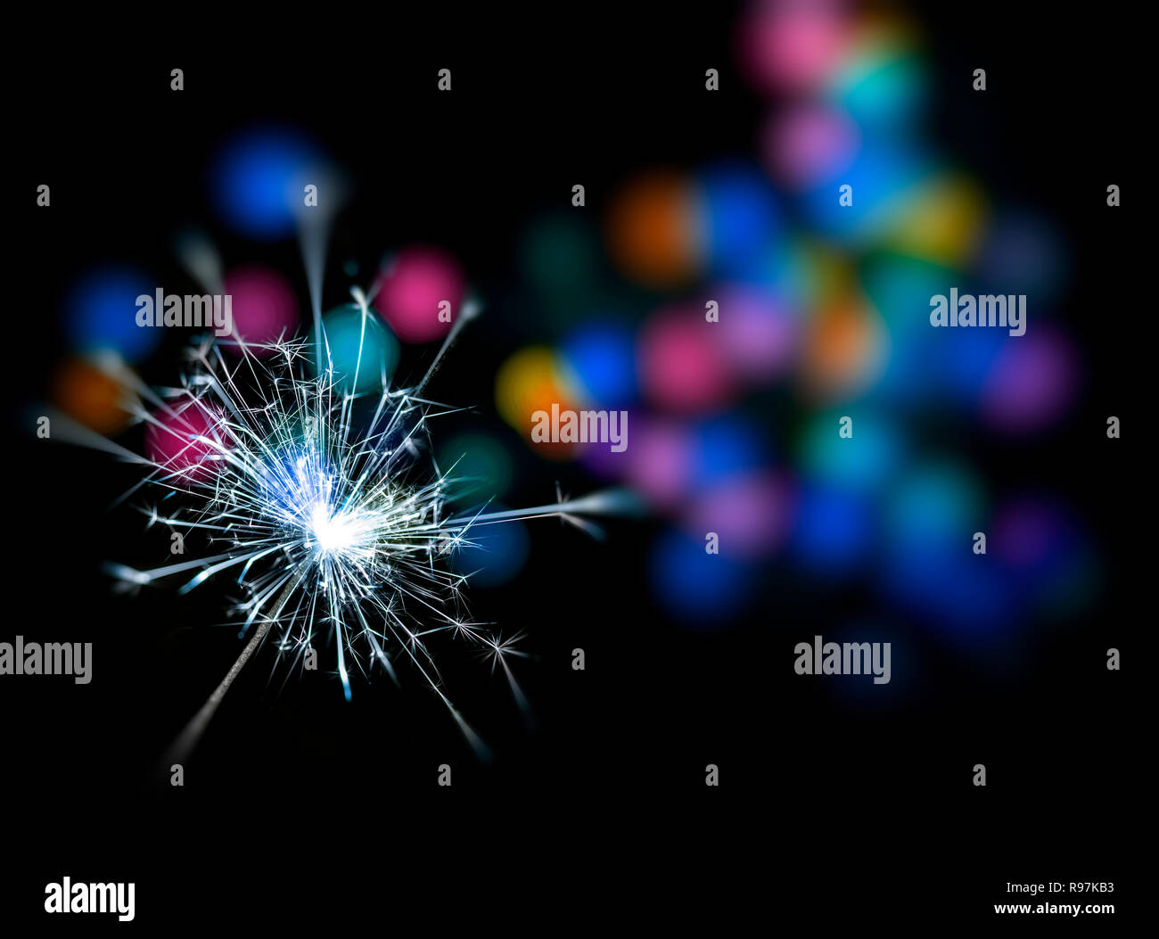 Bengal fire is burning against the background of the New Year's multi ...