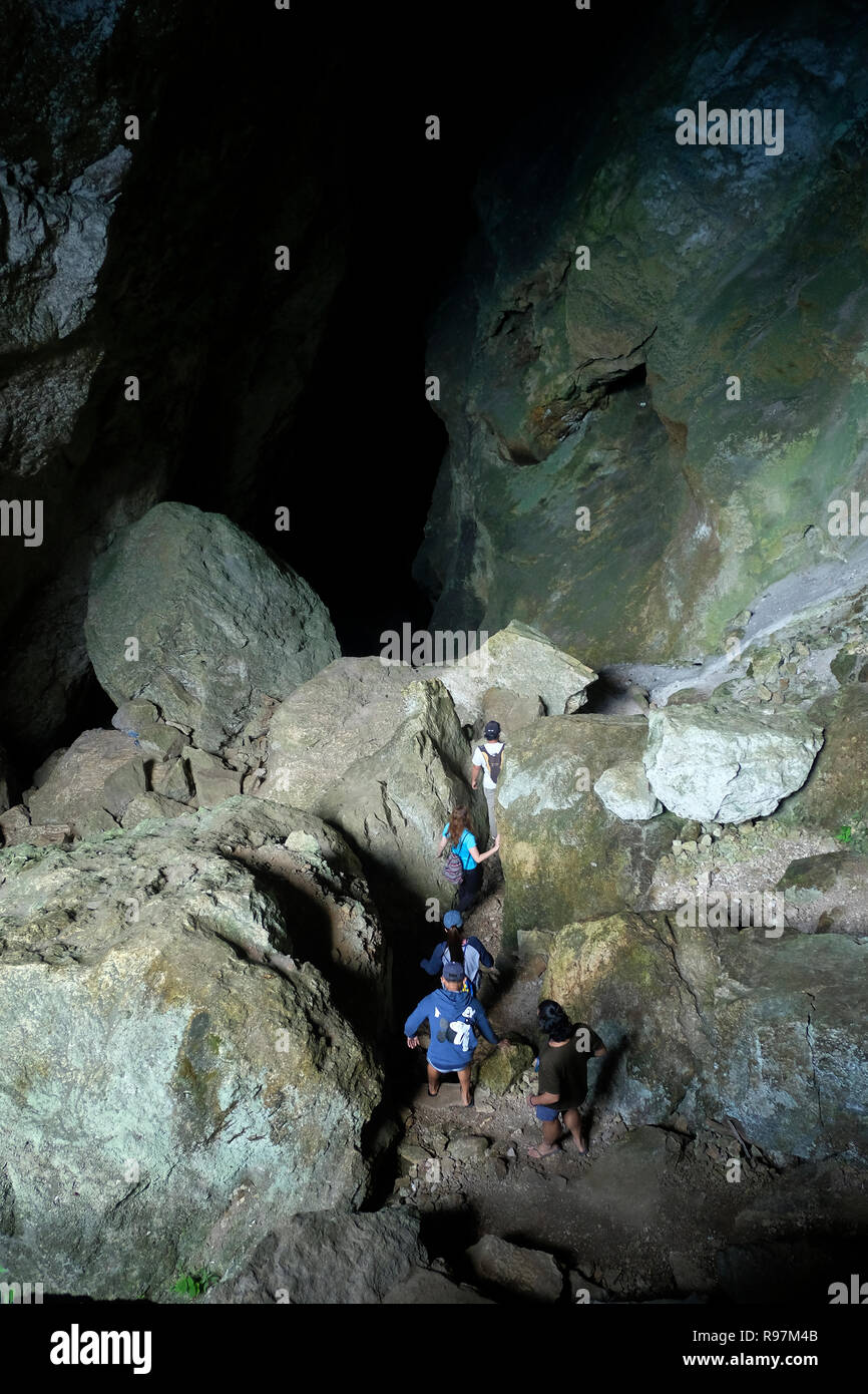 Hikers inside Lumiang Burial Cave located in Sagada in the Cordillera Mountains in Luzon Island ...