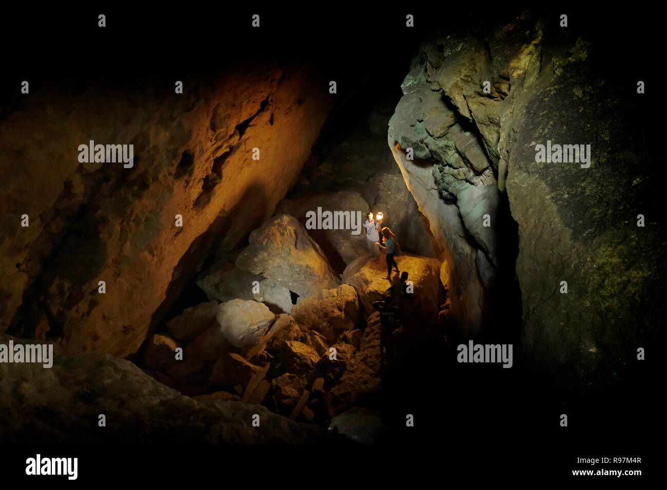 Hikers inside Lumiang Burial Cave located in Sagada in the Cordillera Mountains in Luzon Island ...