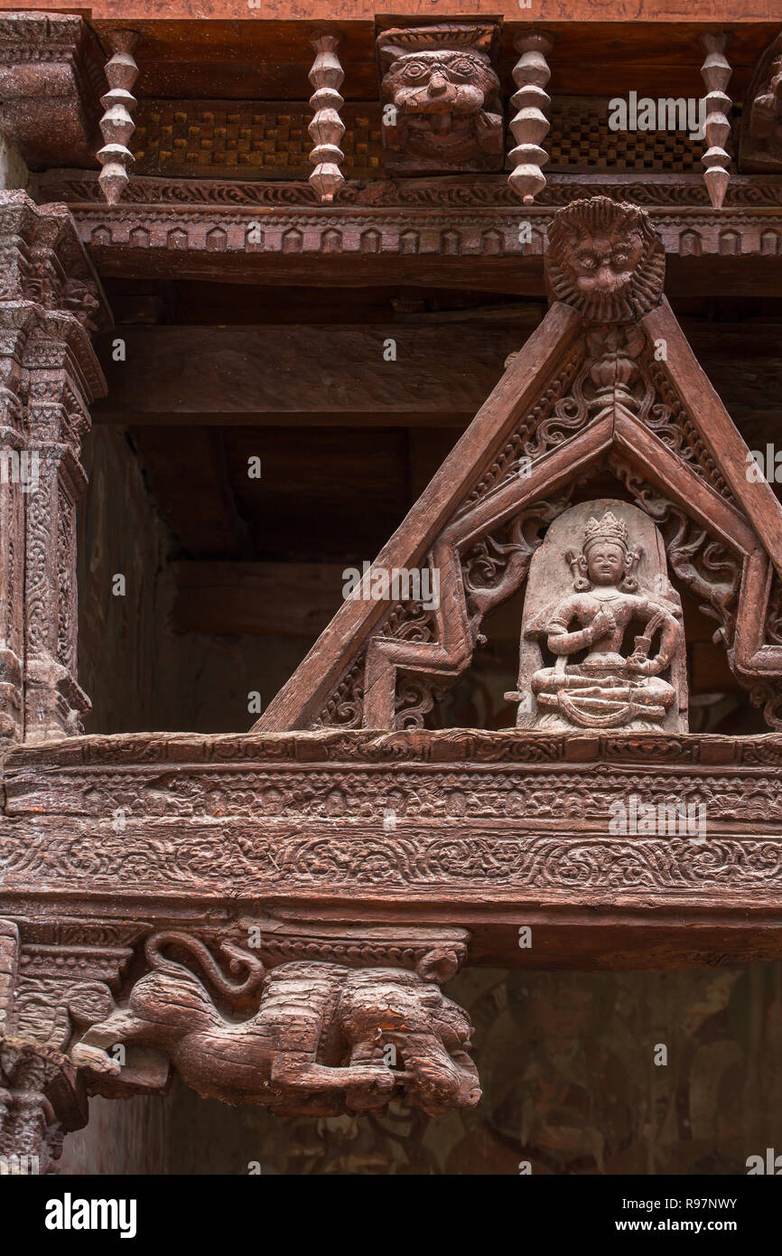 Ancient wooden carving on the entrance to Alchi monastery in Ladakh ...