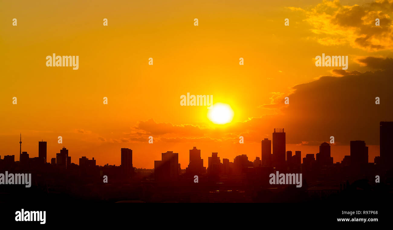 Silhouette City Sunset in Johannesburg South Africa with dramatic red ...