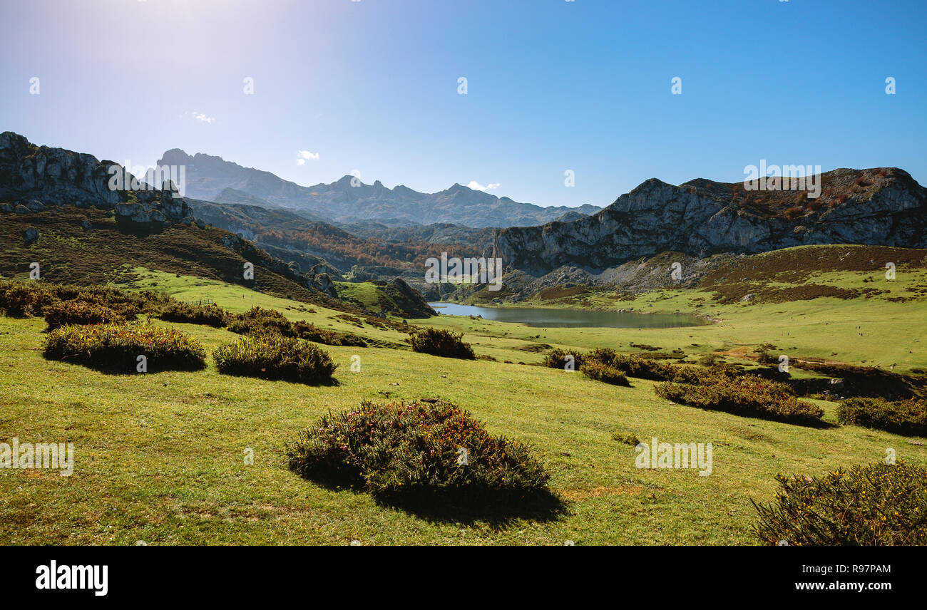 Valley with lake between mountains Stock Photo - Alamy