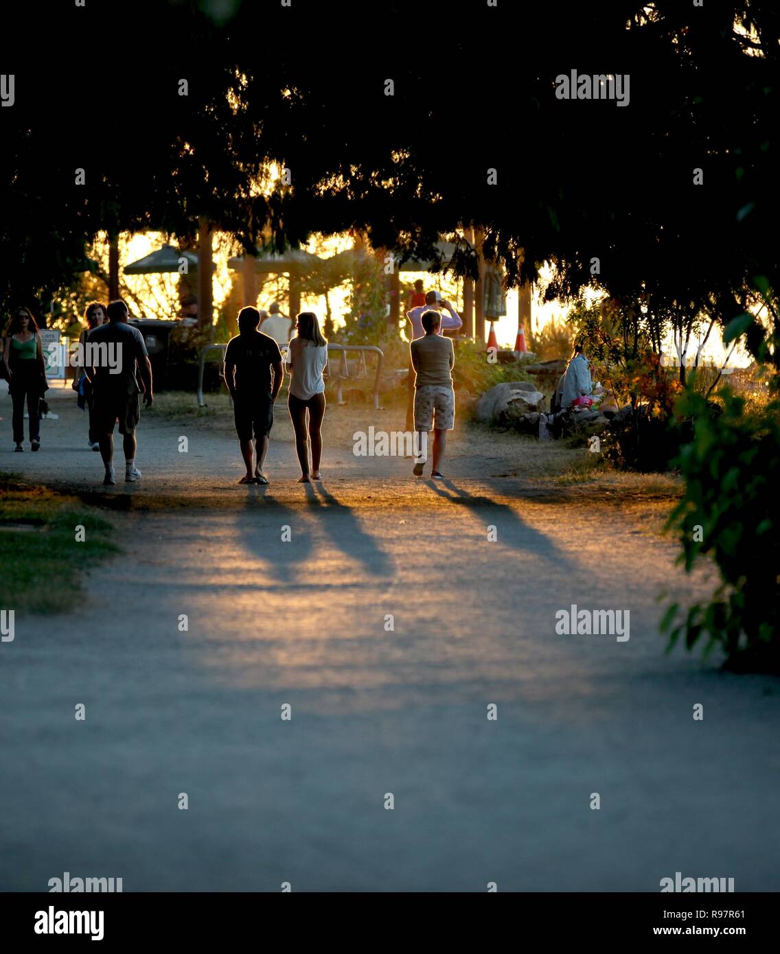 Beach Sunset People Stock Photo - Alamy