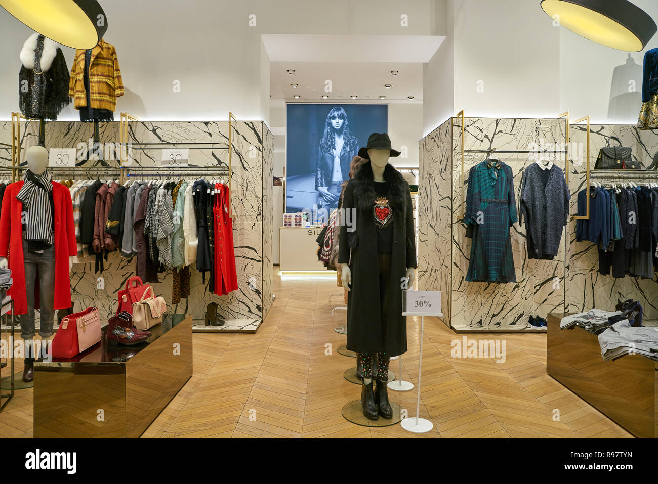 MILAN, ITALY - CIRCA NOVEMBER, 2017: clothing on display at retail ...