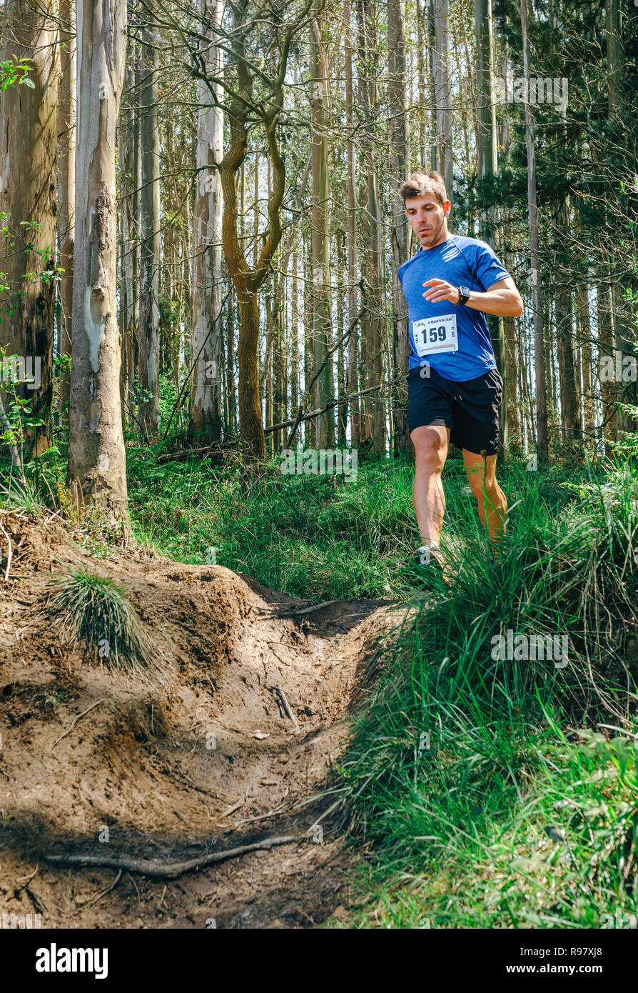 Man participating in trail race Stock Photo - Alamy