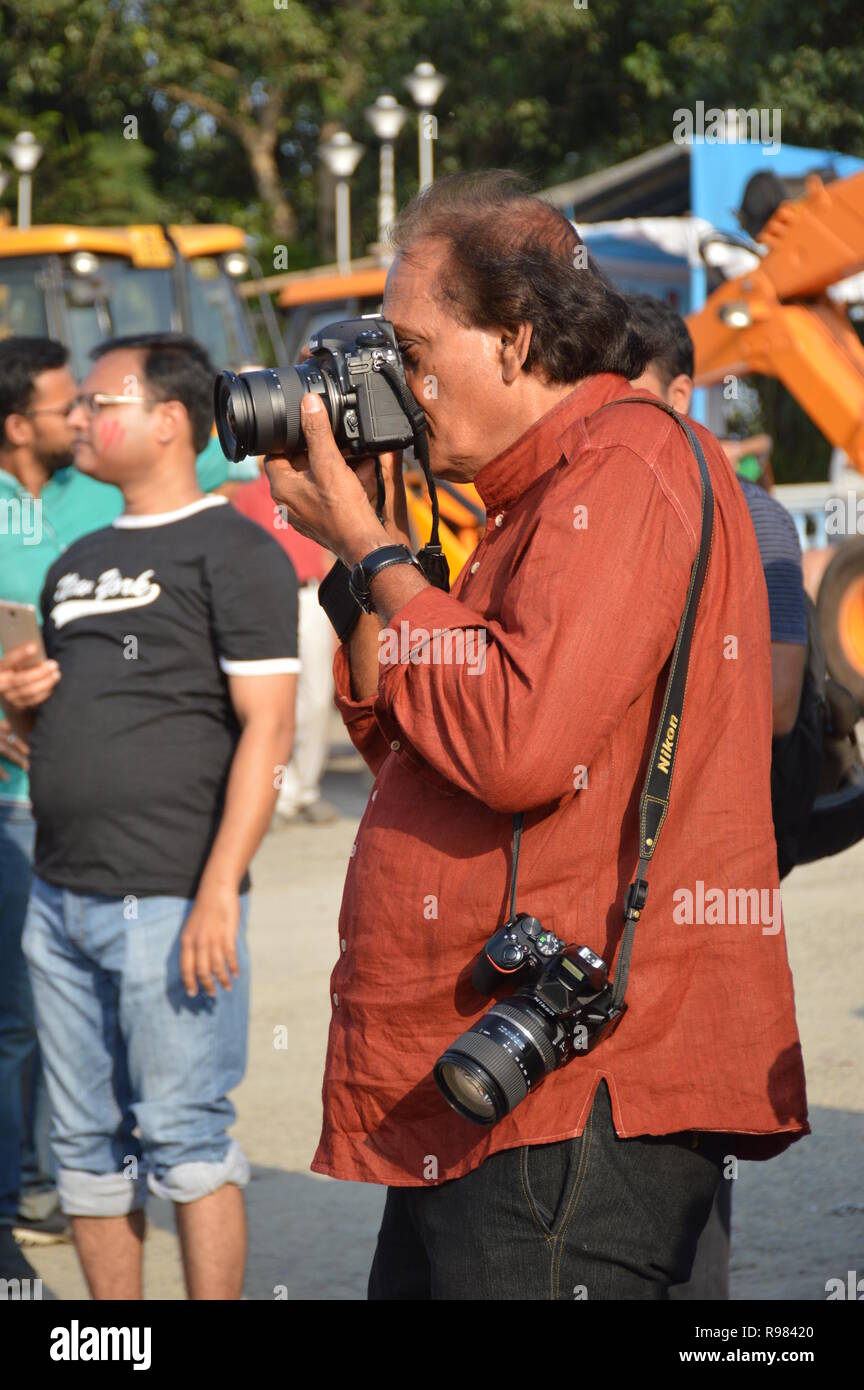 Veteran photojournalist Raghu Rai (b 1942) during the Durga Idol ...