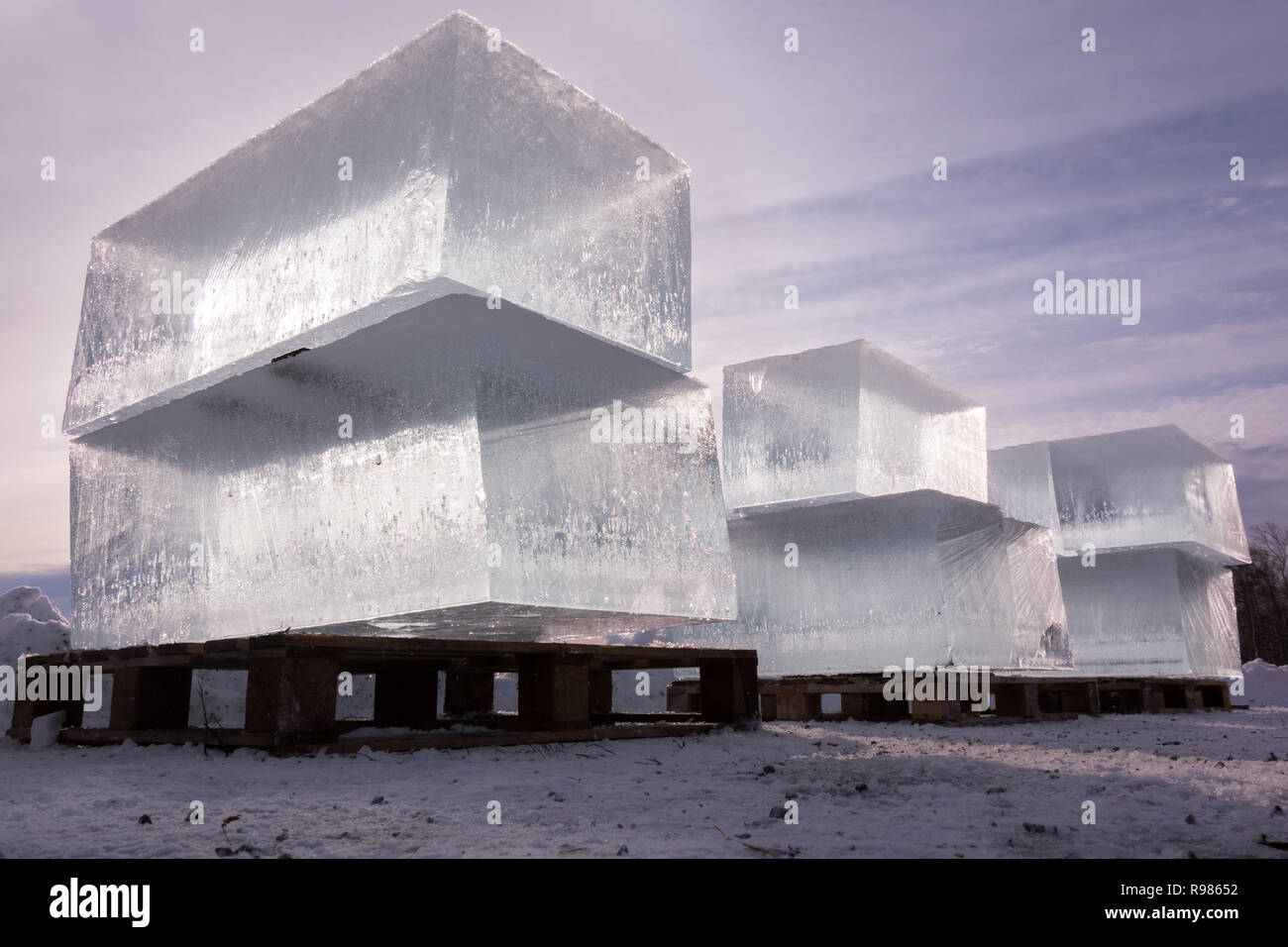 Huge blocks of clear ice severed for ice sculpture loaded on wooden ...