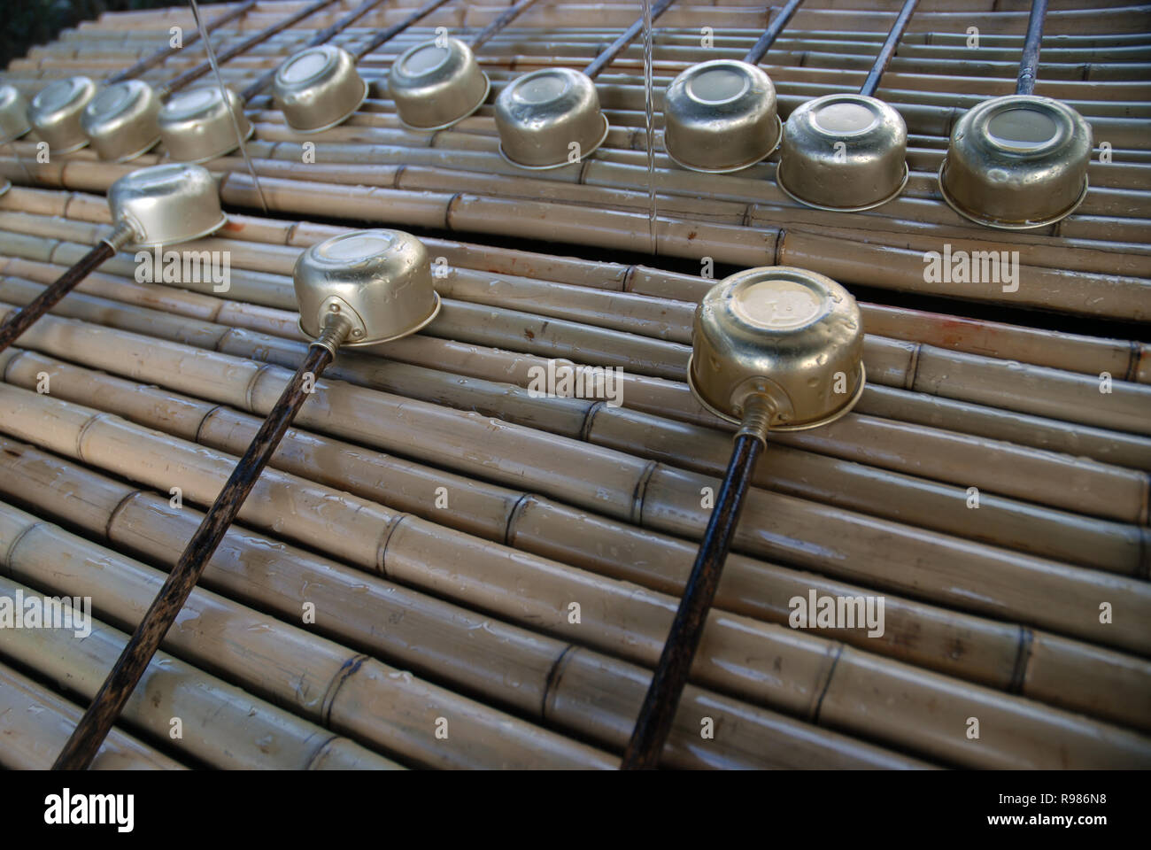 Water fountain and ladles at Todai-ji Temple, Kyoto, Japan Stock Photo ...