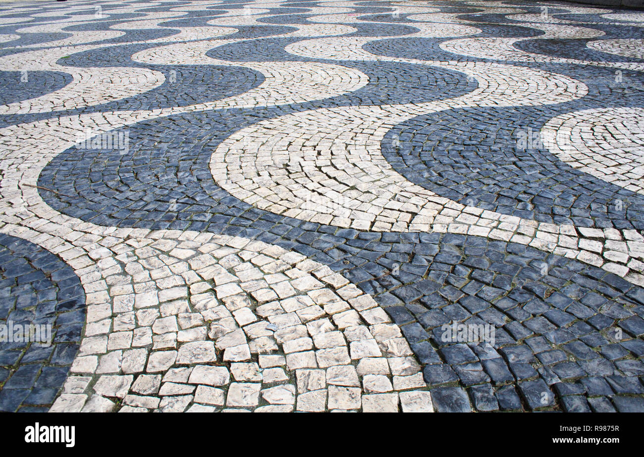 Tiled sidewalk in old town lisbon hi-res stock photography and images ...
