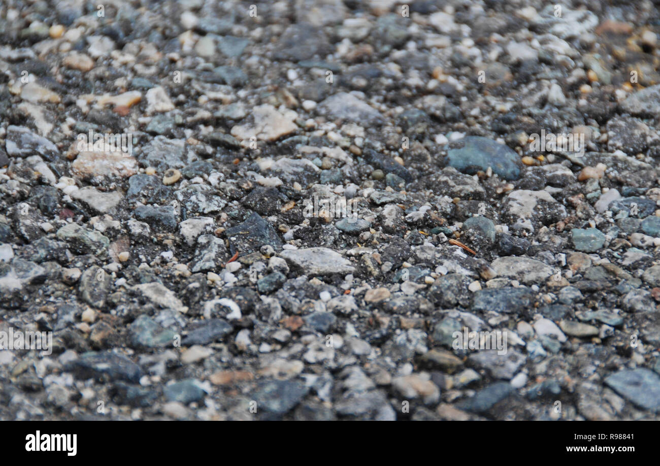 Stones on the road hi-res stock photography and images - Alamy