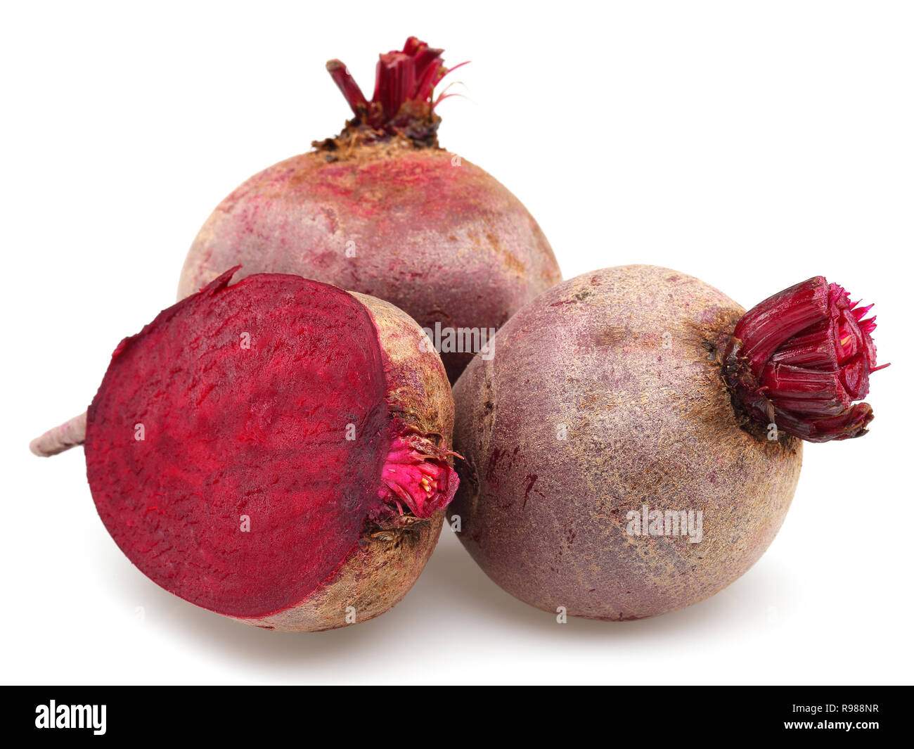 Whole and half red beet roots isolated on white background Stock Photo ...