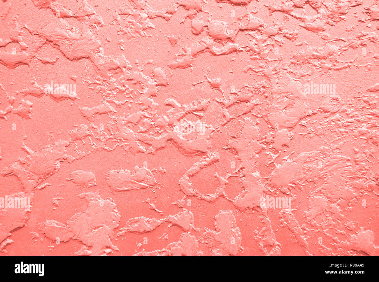 Beautiful coral color glittering decorative plaster wall. Color of 2019 ...