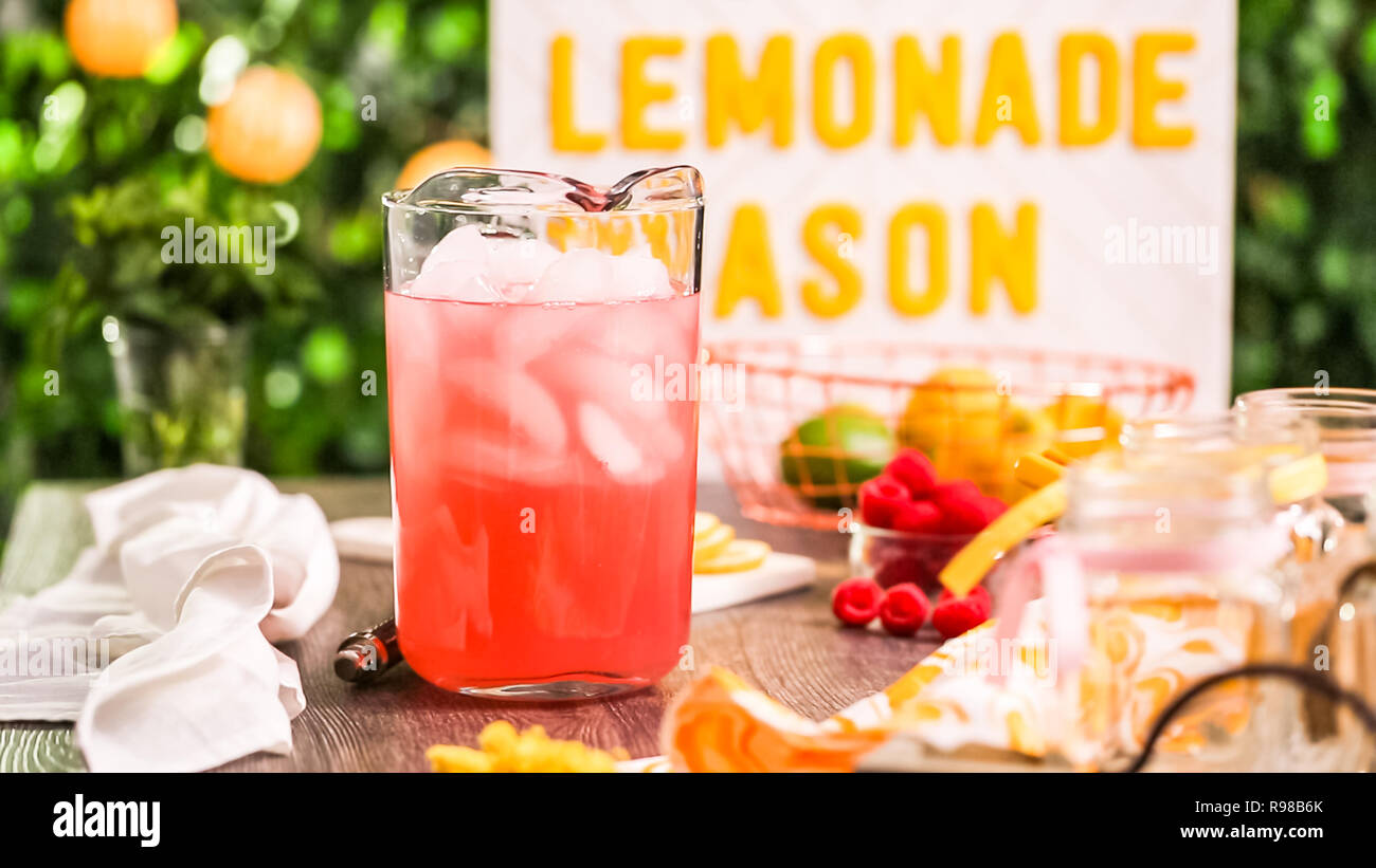 Step by step. Preparing raspberry lemonade with fresh lemons and ...