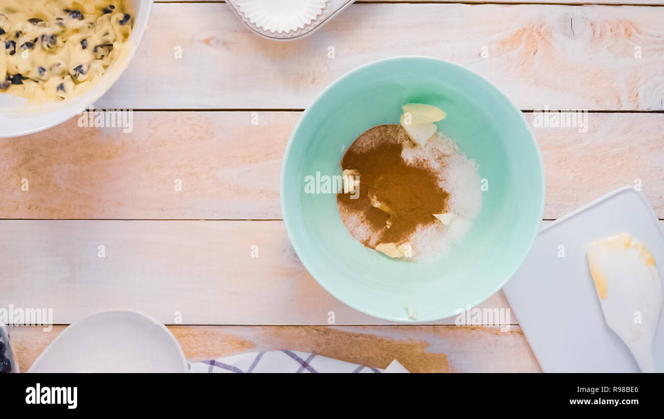 Mixing ingredients together in mixing bowl for blueberry muffins Stock ...