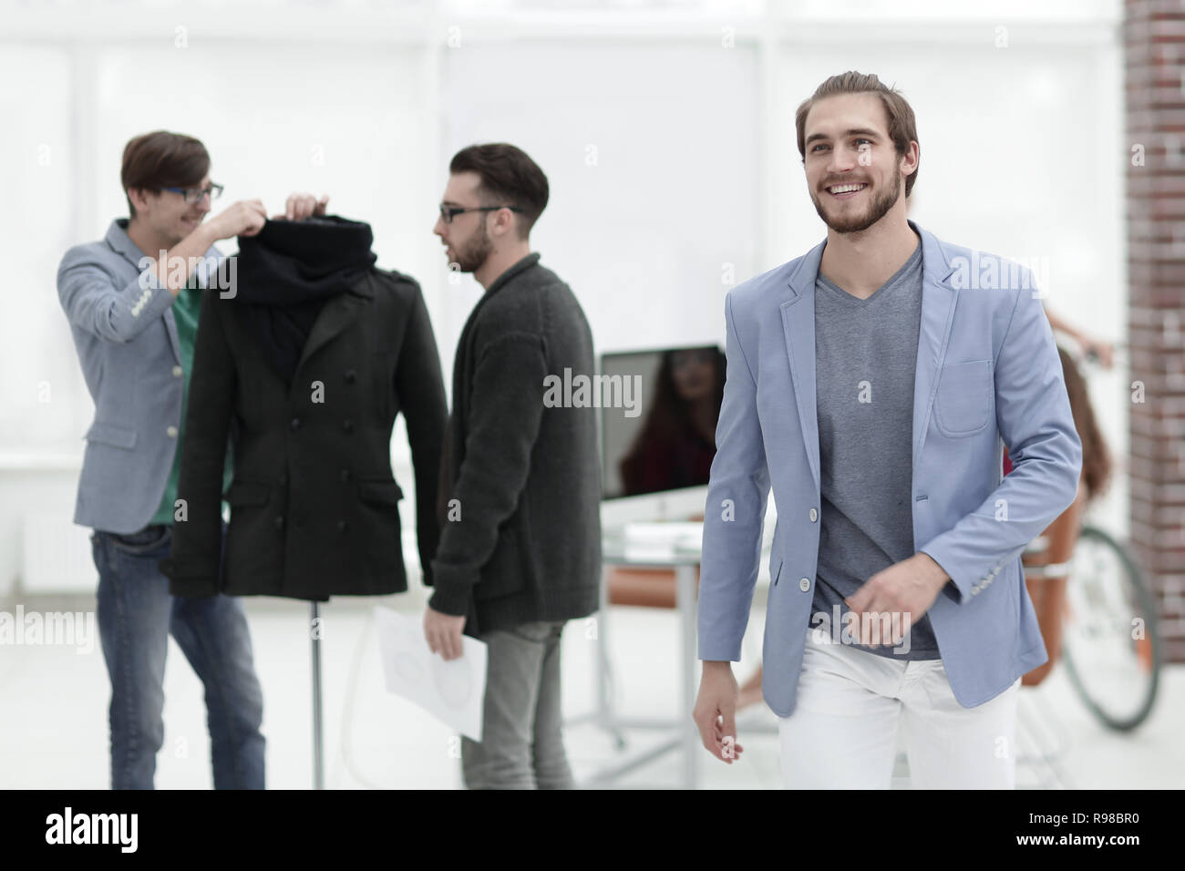 tailors and designers working on new models of clothes Stock Photo - Alamy