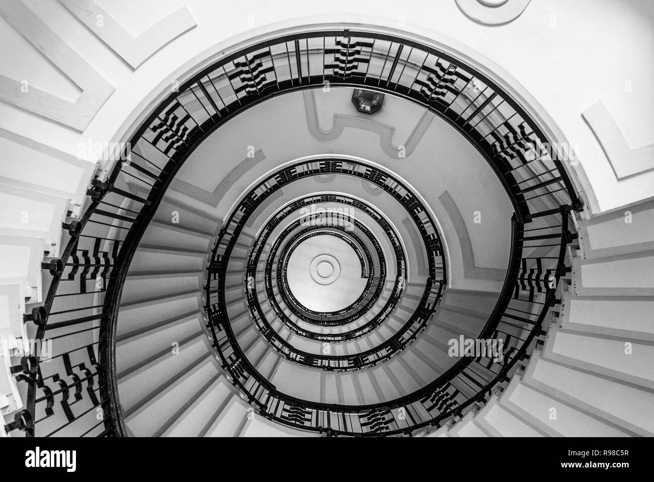hypnotic pattern of a spiral staircase, from the bottom Stock Photo - Alamy