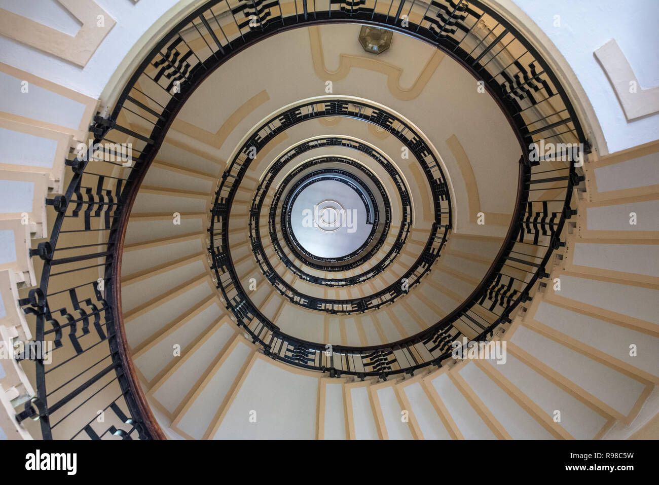 hypnotic pattern of a spiral staircase, from the bottom Stock Photo - Alamy