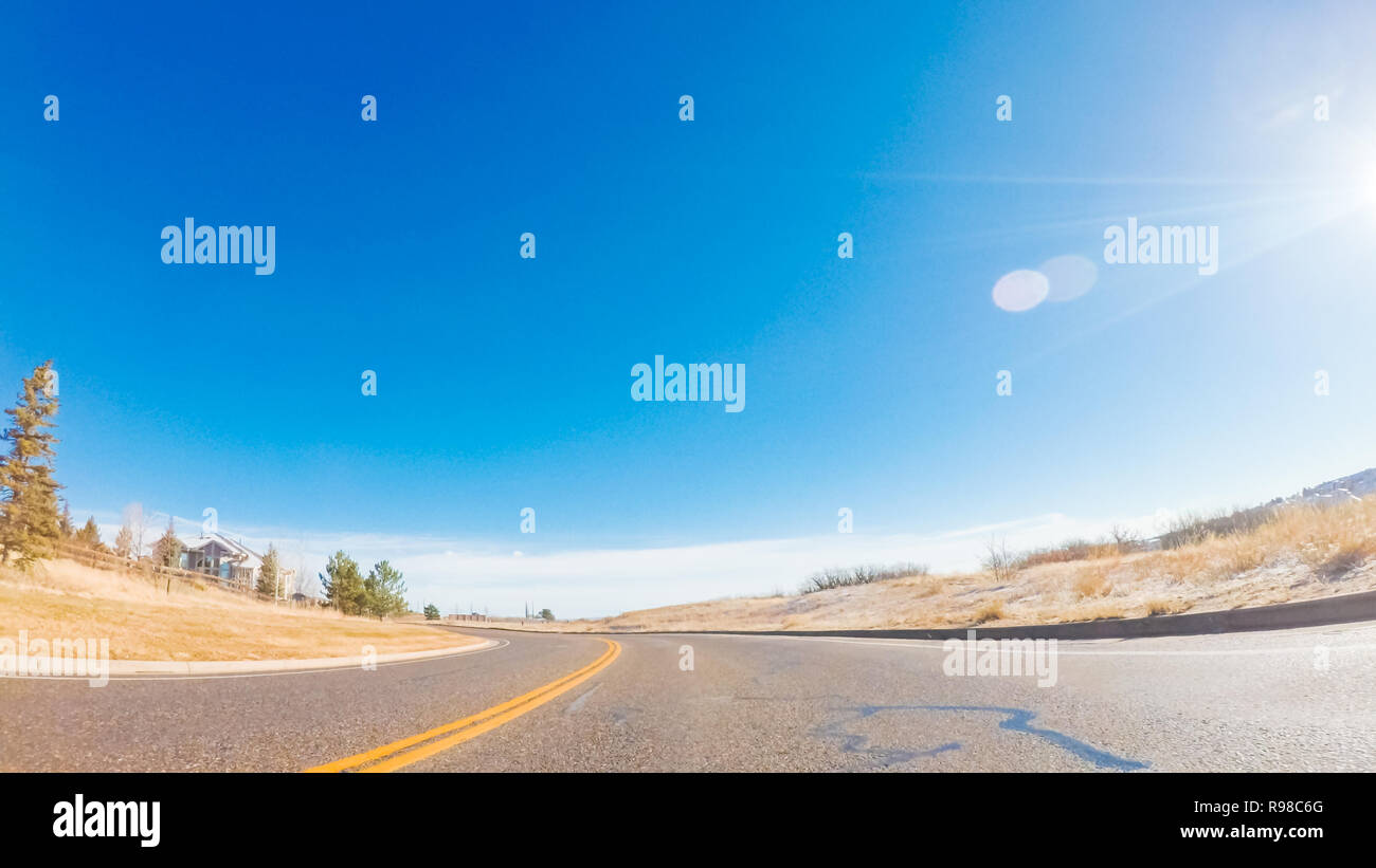 Driving in rural area of suburban neighborhood Stock Photo - Alamy