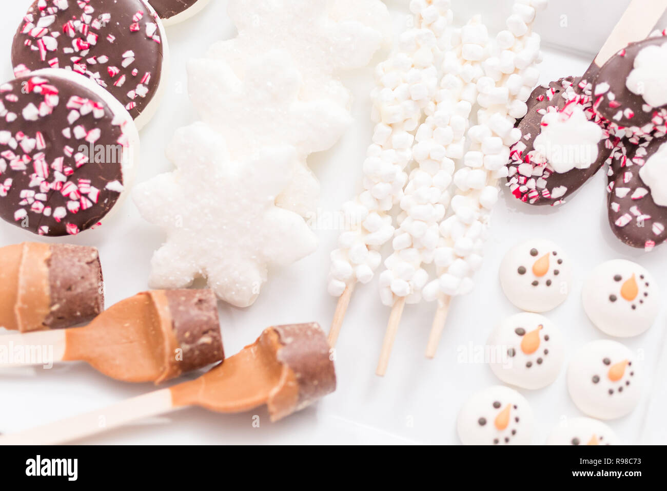 Close up view. Variety of marshmallow toppings with peppermint and ...