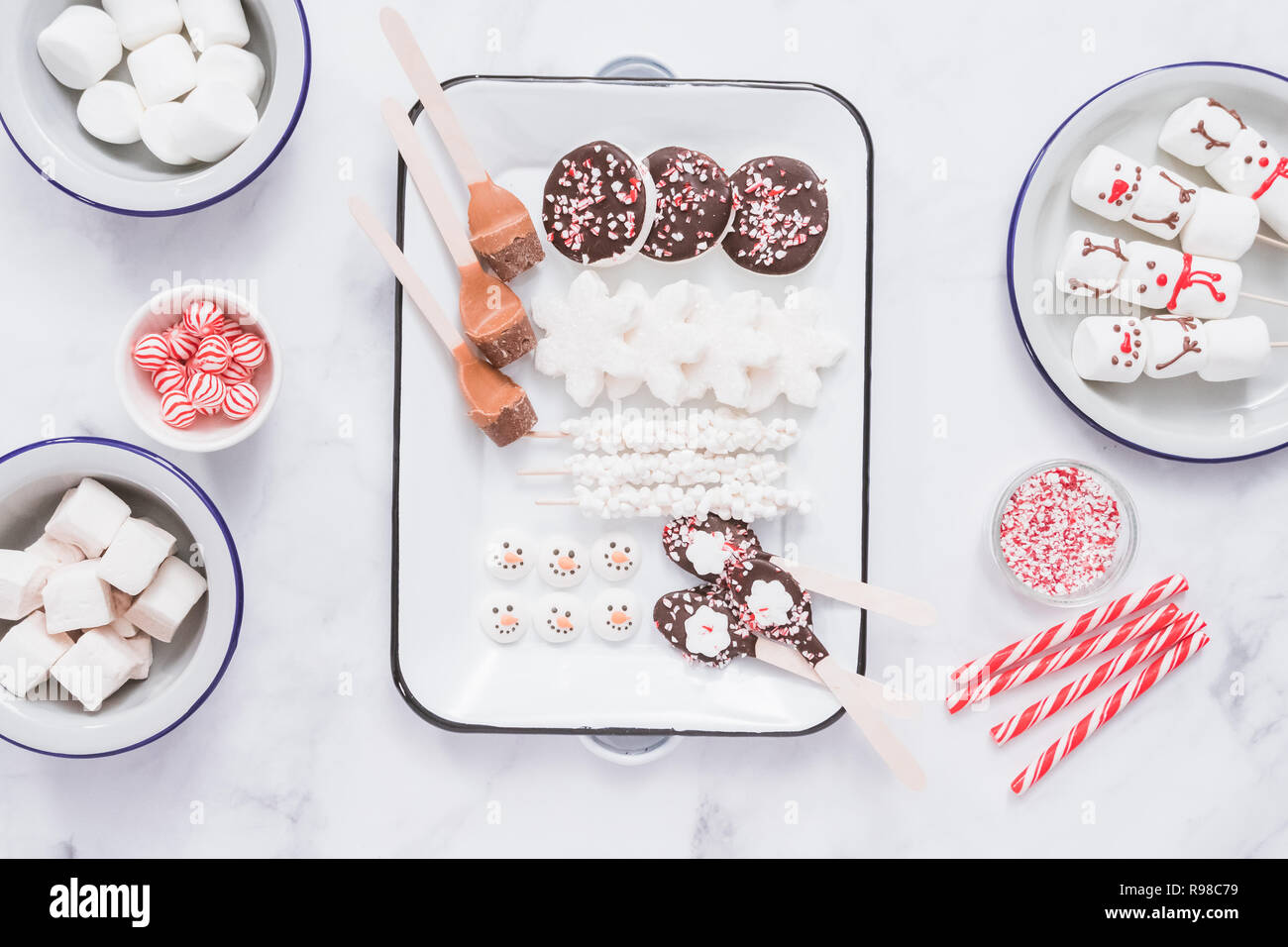 Flat lay. Variety of marshmallow toppings with peppermint and chocolate ...