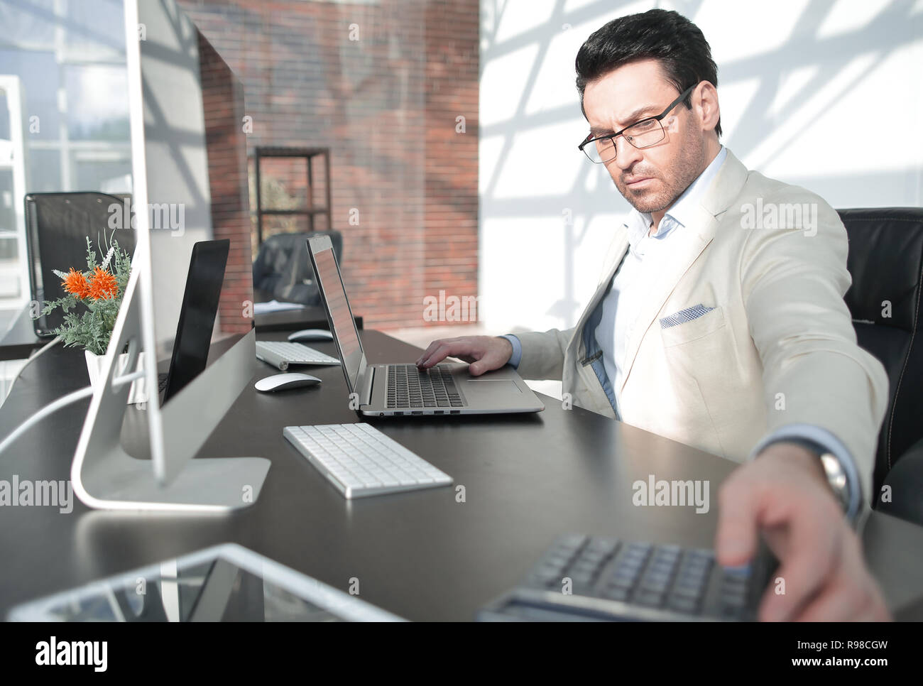 Man behind office desk studying hi-res stock photography and images - Alamy