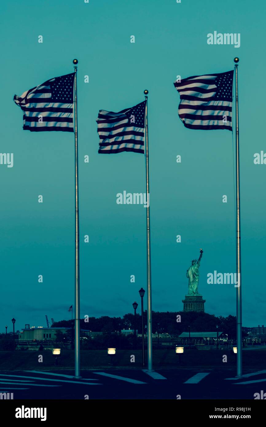 Flags fly over Statue of Liberty, Liberty Park, Jersey City, New Jersey ...