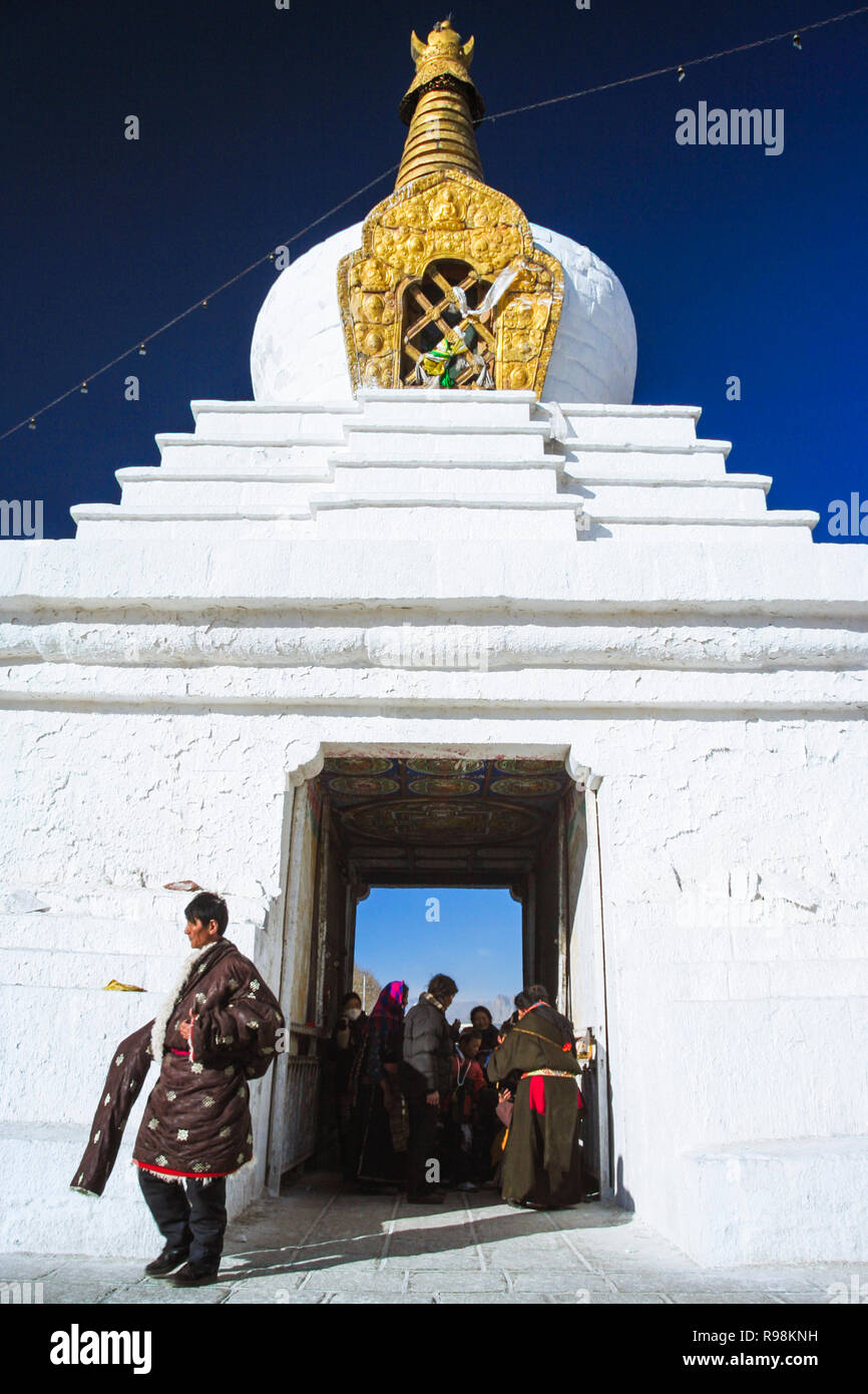 Lhasa, Tibet Autonomous Region, China : Tibetan pilgrims stand under a ...