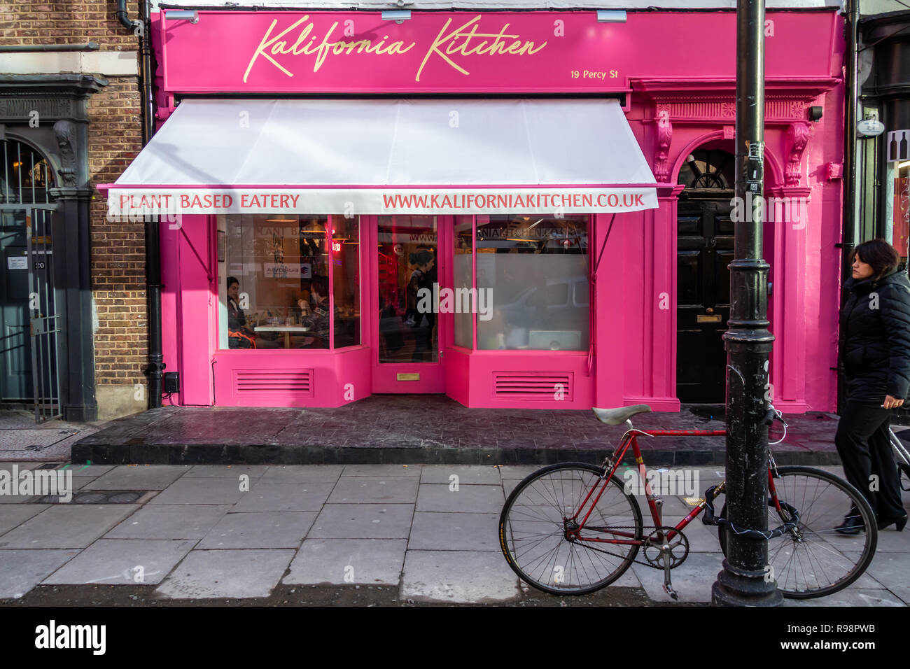 Full frontal photography of the Pink Exterior of Kalifornia Kitchen a ...