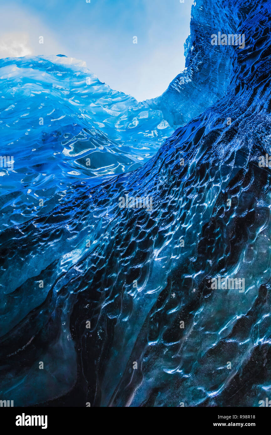 The melted sides of a vertical shaft of a moulin, aka glacier mill, the ...