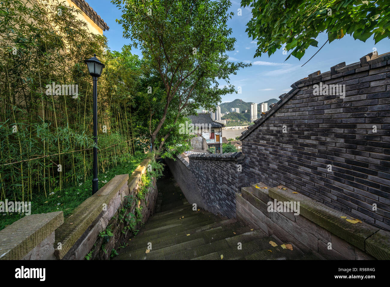 Traditional Chinese alley with nature in Chongqing Stock Photo - Alamy