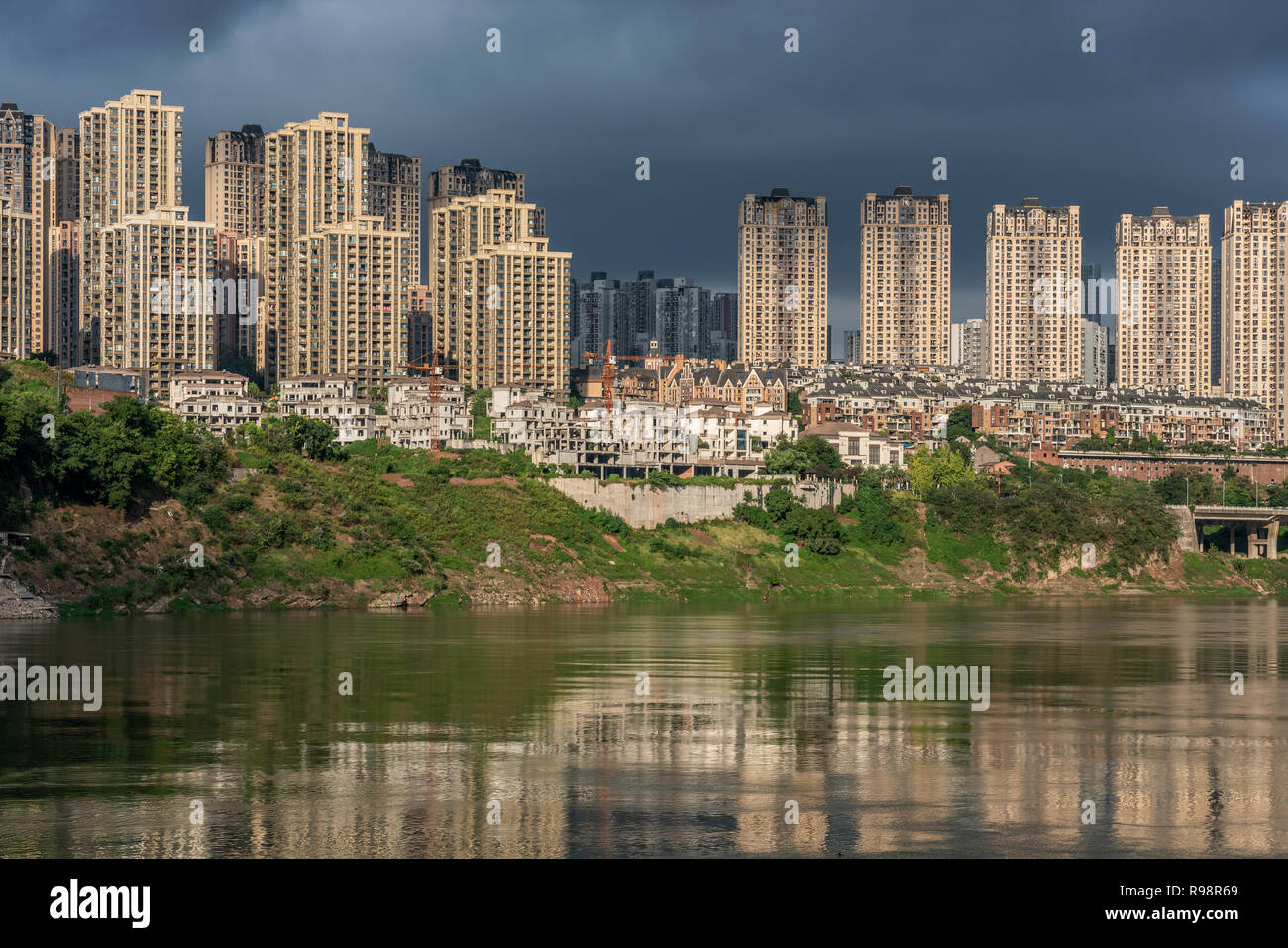 CHONGQING, CHINA - SEPTEMBER 16: Modern high rise buildings and old ...