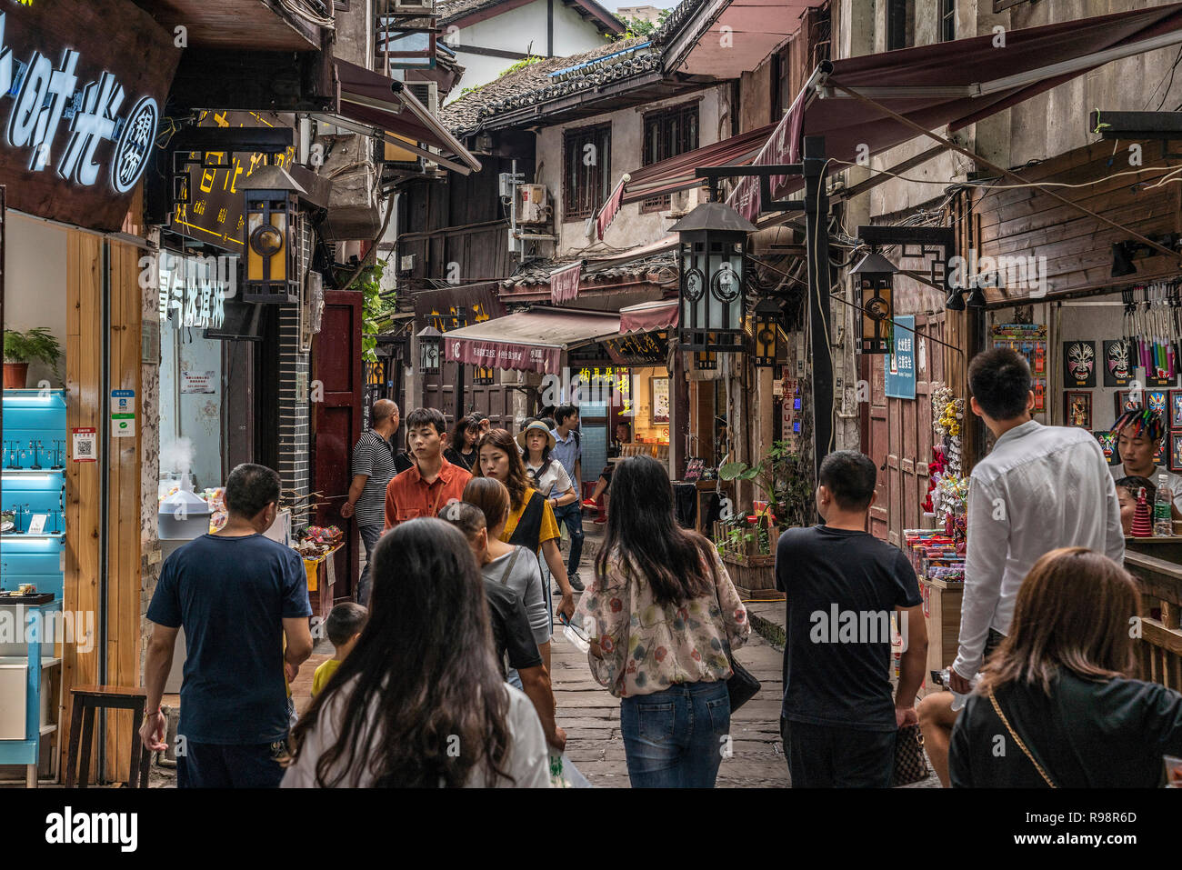 CHONGQING, CHINA - SEPTEMBER 20: Historic old town alley with shops and ...