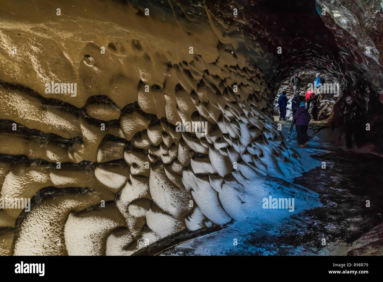 The melted sides of a vertical shaft of a moulin, aka glacier mill, the ...
