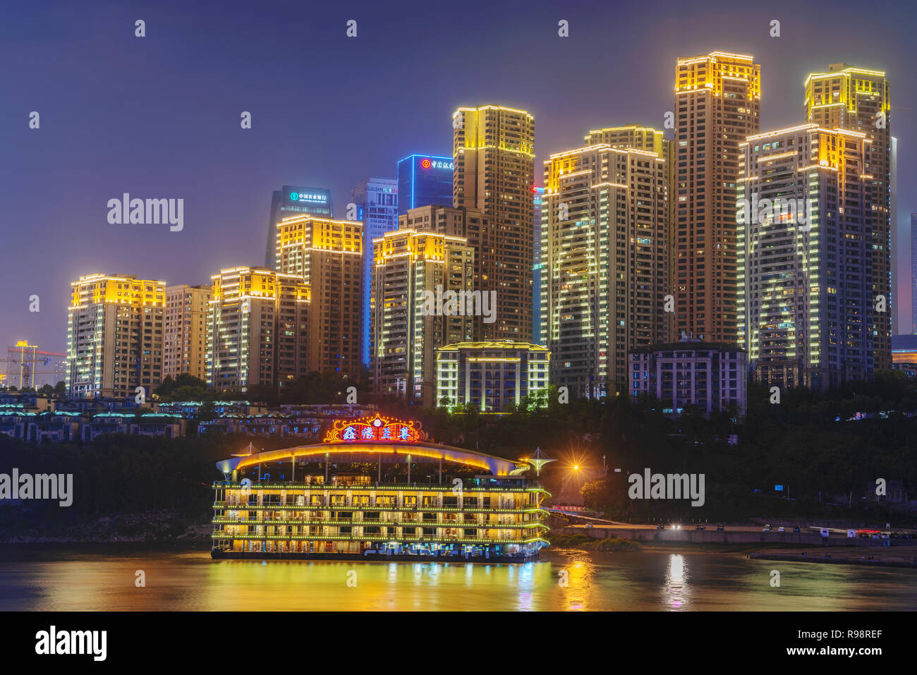 CHONGQING, CHINA - SEPTEMBER 23: Night view of modern high rise ...