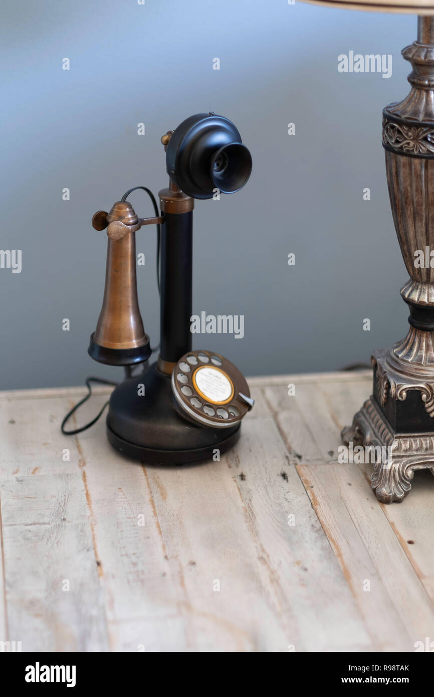 A faux Candlestick telephone, a replica, in the popular style of Modern ...