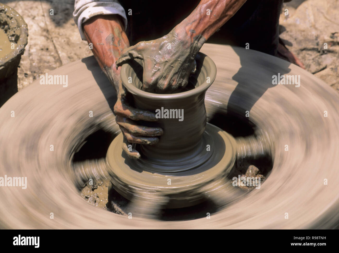 Potter turning potters wheel hi-res stock photography and images - Alamy