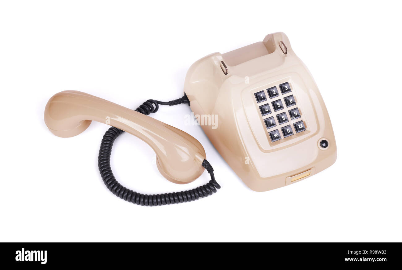 Vintage brown telephone with a white background Stock Photo - Alamy