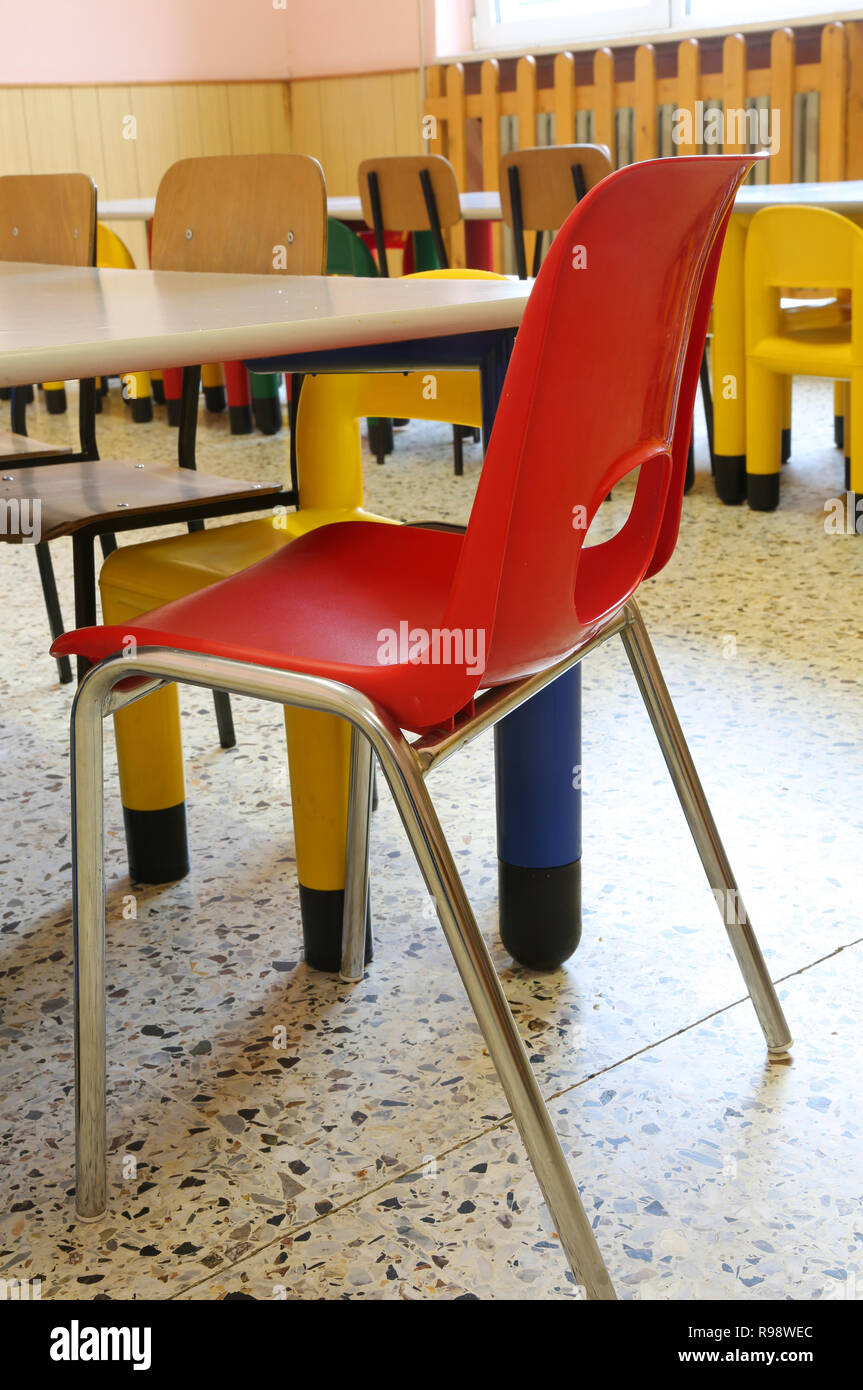 red chair for children inside the school room Stock Photo - Alamy