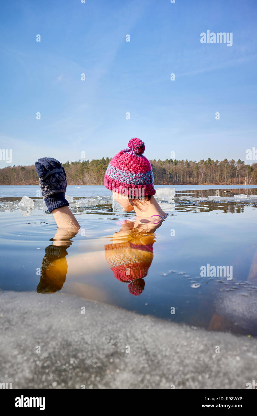 Woman in frozen water hi-res stock photography and images - Alamy
