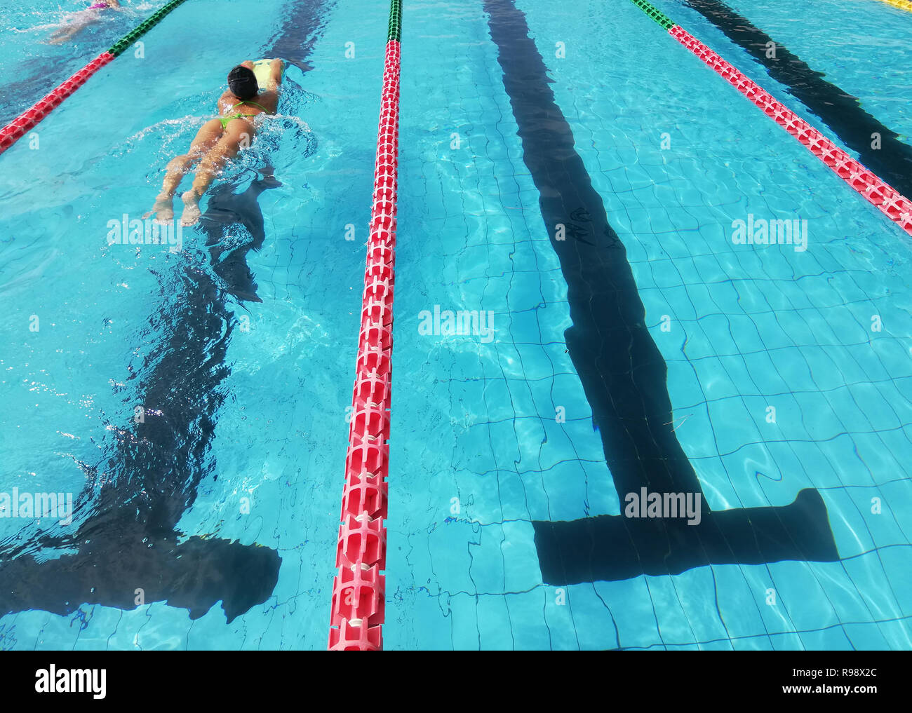 swimmer in lane pool, woman in water Stock Photo - Alamy