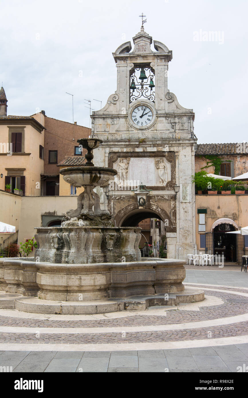 Sutri in Lazio, Italy. The Town Hall, fountain and war memorial Stock ...