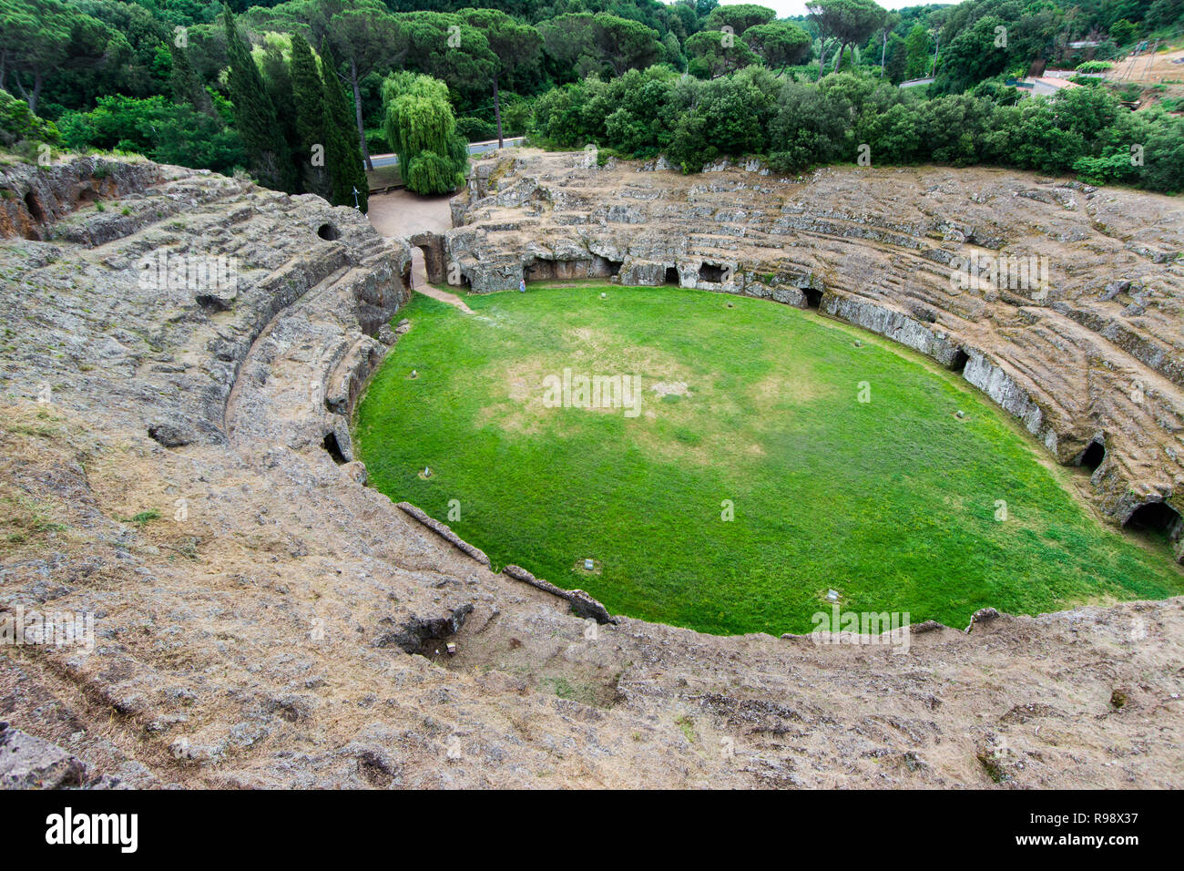 Sutri in Lazio, Italy. The rock-hewn amphitheatre of the Roman period ...