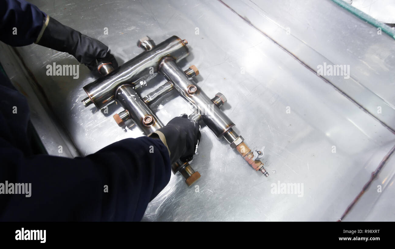 Industrial manufacturing. Cooling the welded detail in the water Stock ...