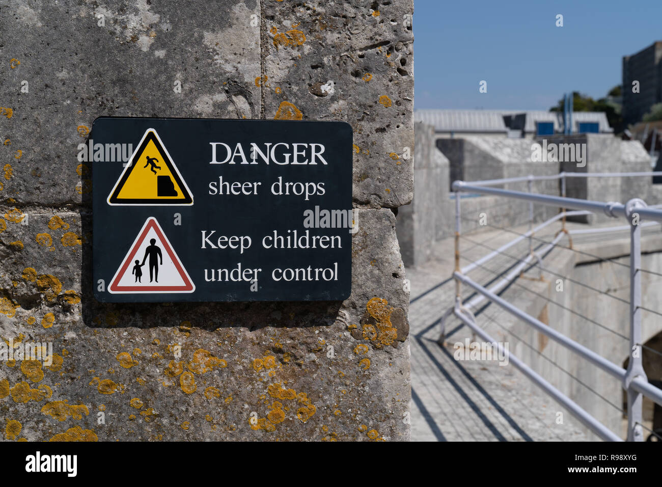 Danger sudden drop sign yellow warning triangle with symbol of man ...
